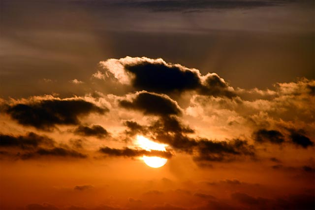 Imagenes de sol entre nubes - Imagui