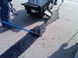 MECO: Hot Applied & Pourable Polymer Modified Asphalt