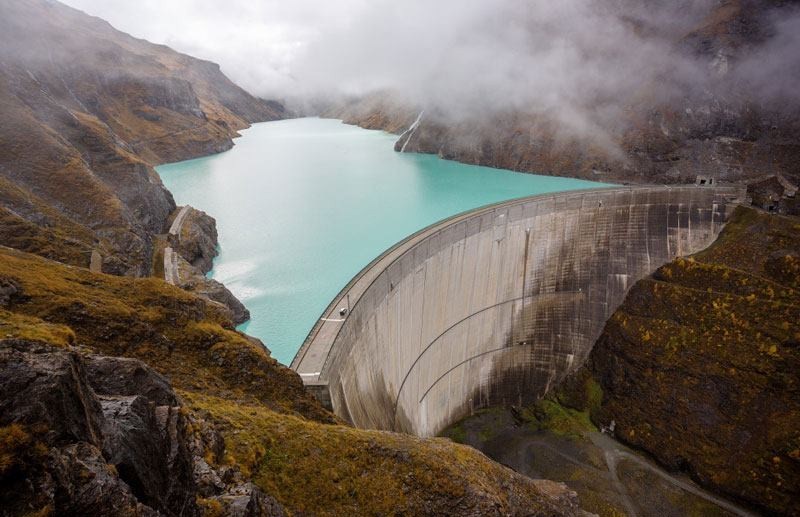 FANS OF NATURE: Mauvoisin Dam is a concrete arch dam across the Val de ...
