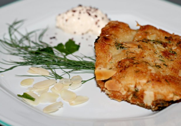 Sabor en cristal: Merluza rebozada con hierbas