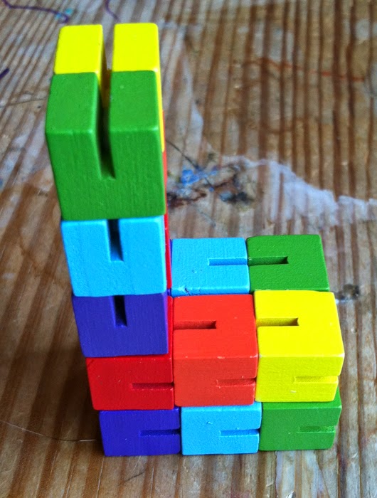 The Map is Not the Territory: 18 cubes + 6 colors + 1 elastic ...