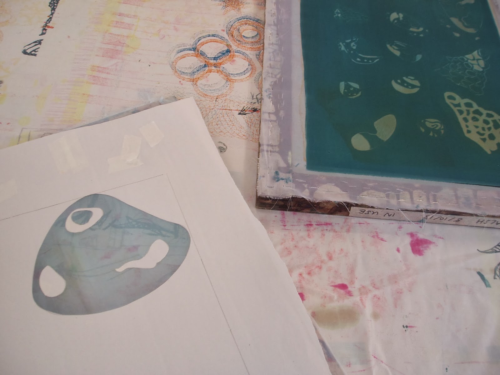 kitchentableprintmaker: paper stencils and photo stencils on pebbles prints