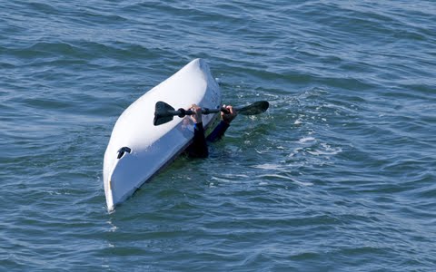 Tourist Town Makes My World Go Round: Drowning in a Kayak