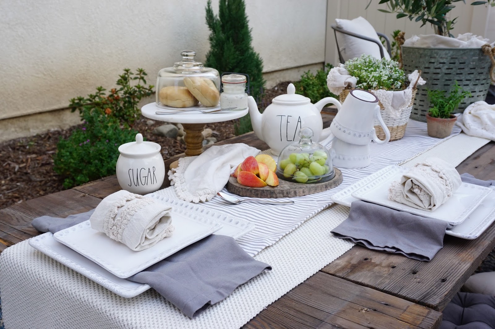 I added my olive tree that is growing pretty well on the patio along ...