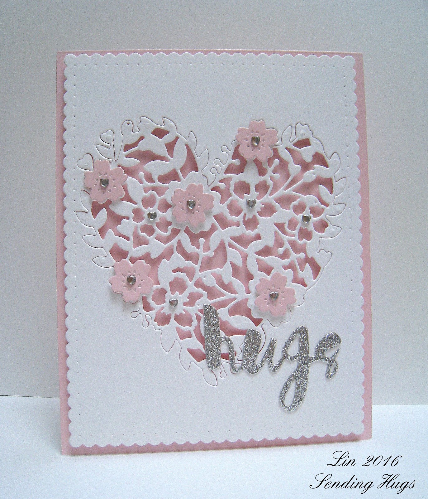 Sending Hugs: A Heart with Hugs and Flowers