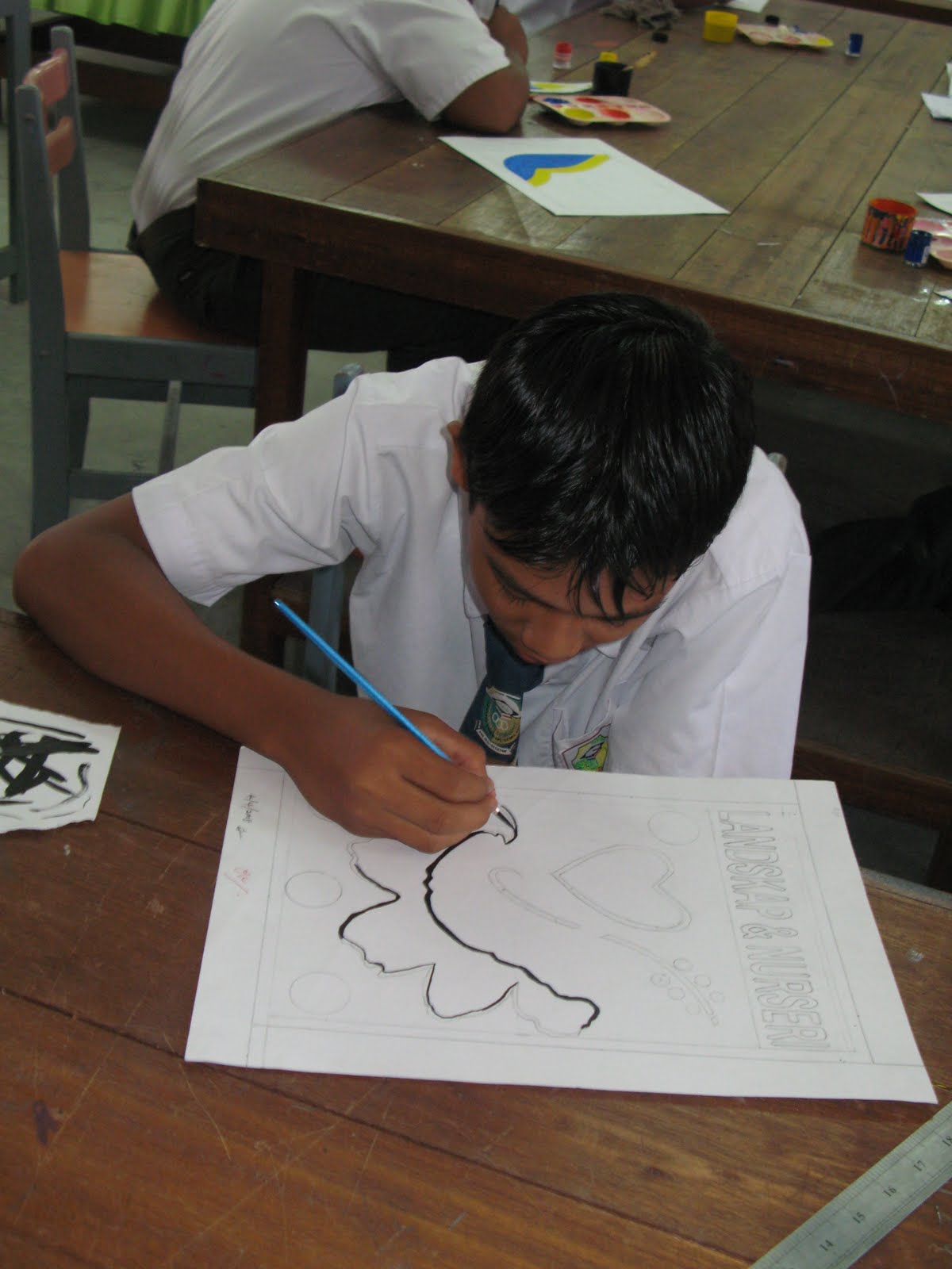 Seni Reka Tanda SMKSI: LOGO