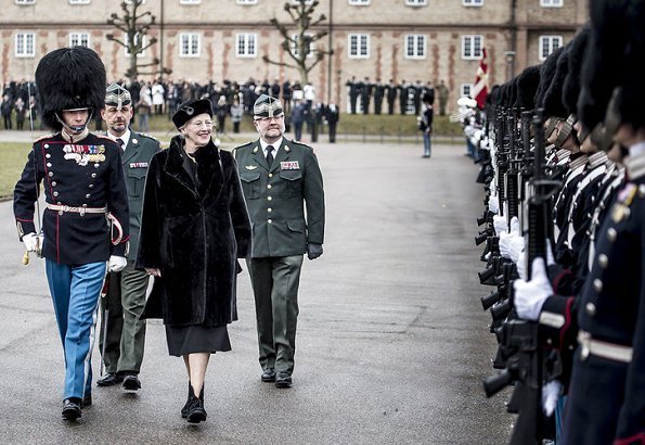 Queen Margrethe attends a military parade at Rosenborg