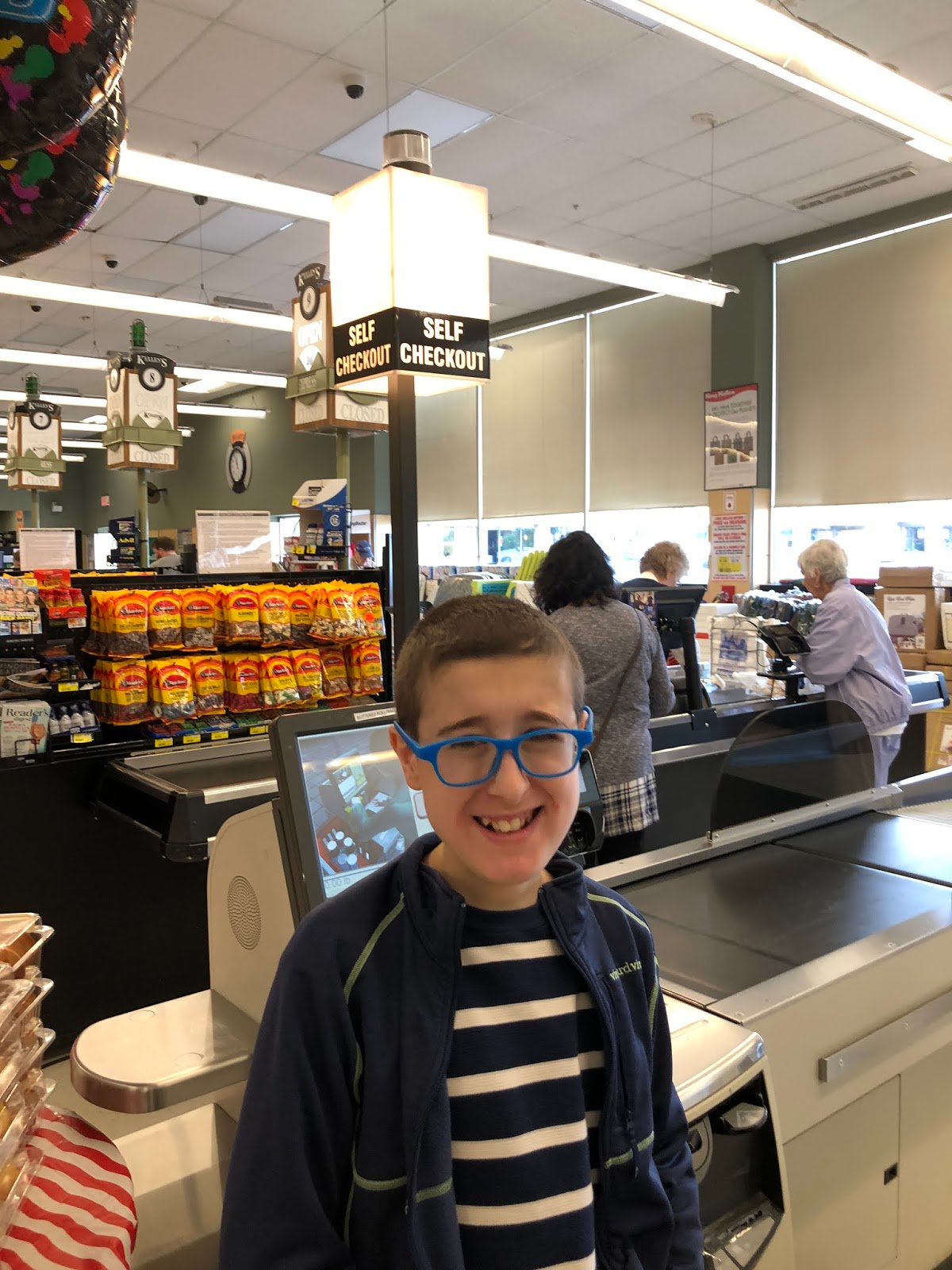 Dancing in the Rain: The Self-Checkout Lane