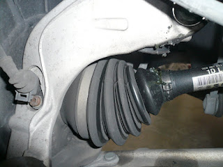 VW Passat Repair: How to Replace The CV Joint Boot on a 2006 VW Passat ...