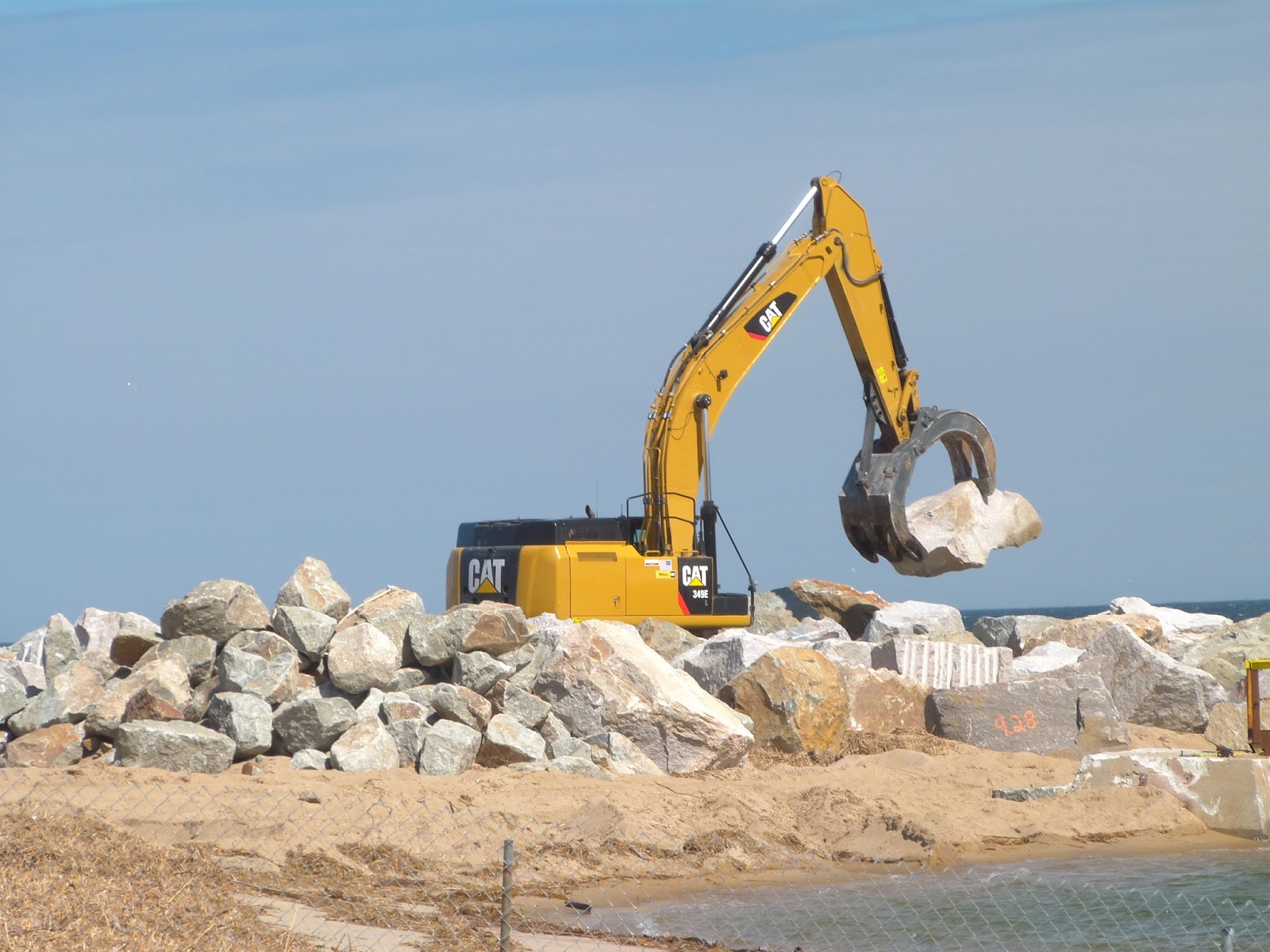 Photo Essay of the Merrimack River North Jetty Repairs: Loading Stone ...