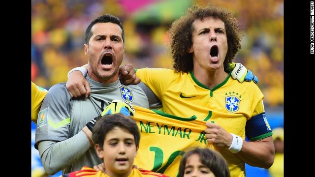 Football Fever: Julio Cesar, left, and David Luiz hold a Neymar jersey ...