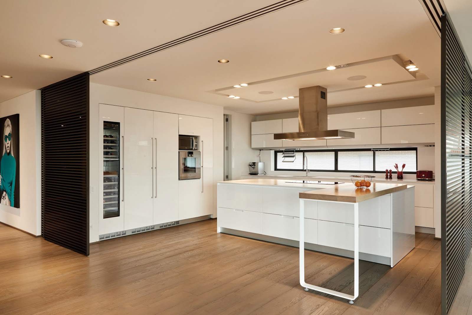 Cocina abierta e integrada en la zona pública de la casa - Schaller ...