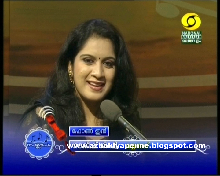 Cute playback singer Akhila anand