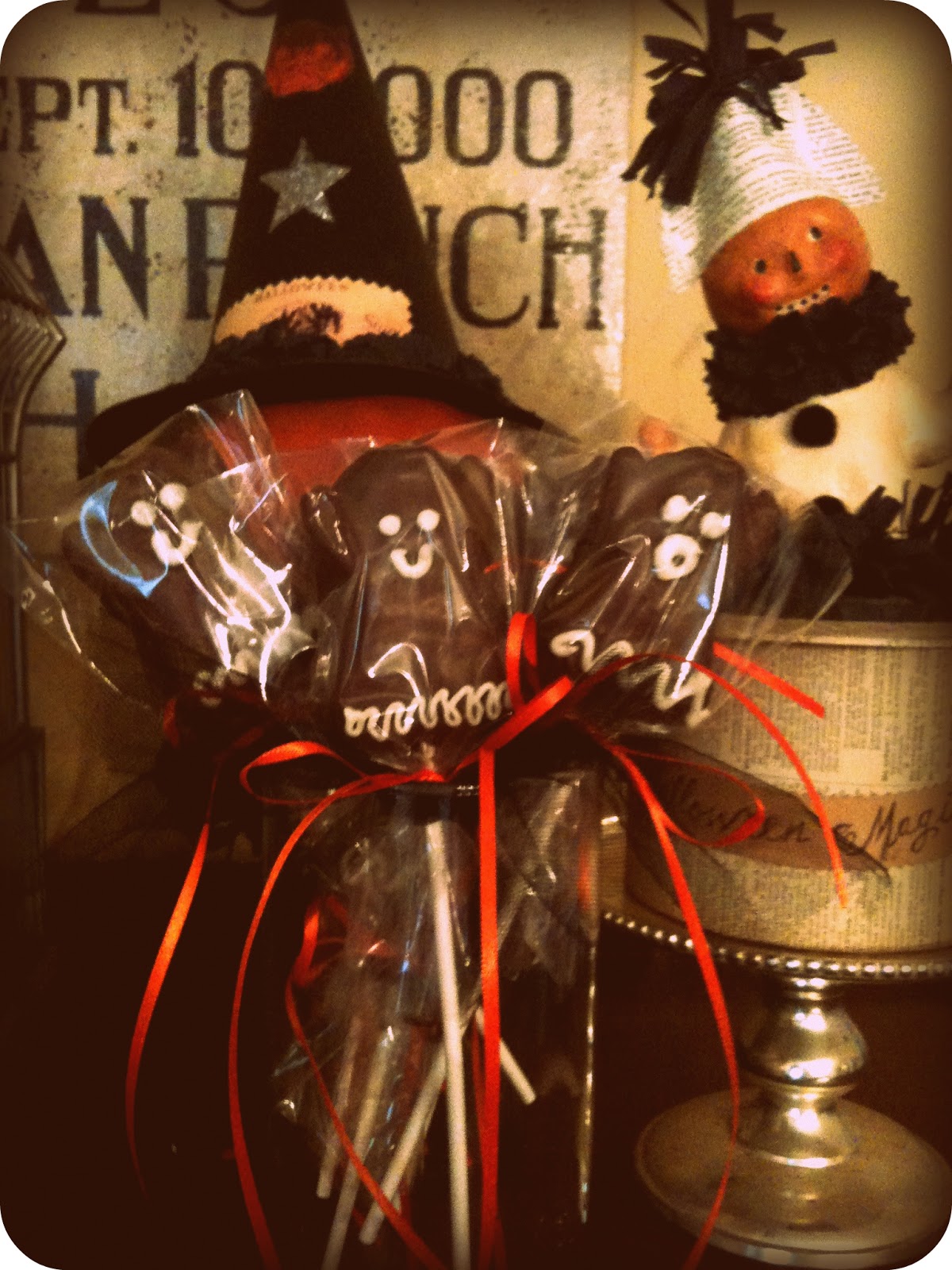 Easy Halloween Treat ~ Chocolate Dipped Ghosts on a Stick!