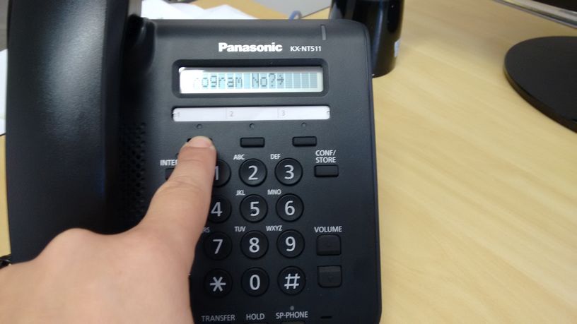 Como alterar o toque de chamada do telefone Panasonic KX-NT511