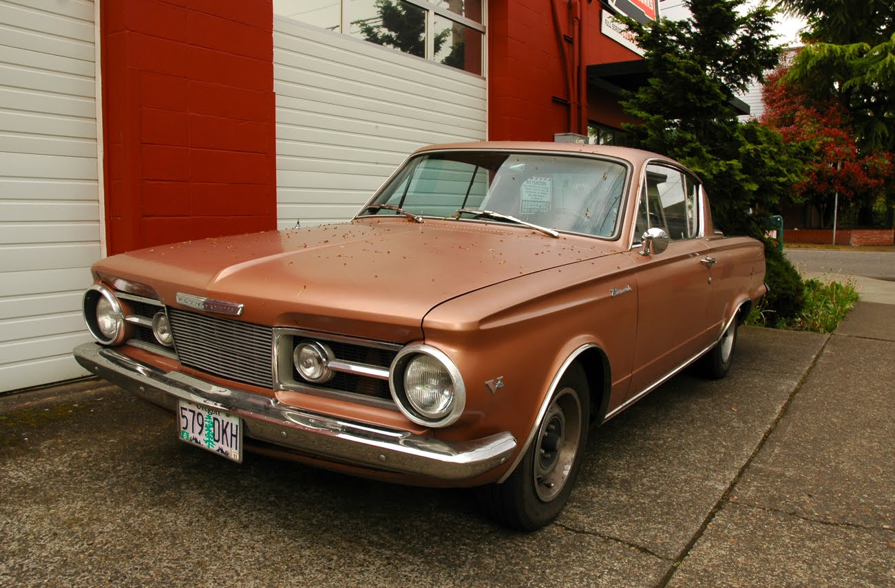 OLD PARKED CARS.: 1964 Plymouth Barracuda.
