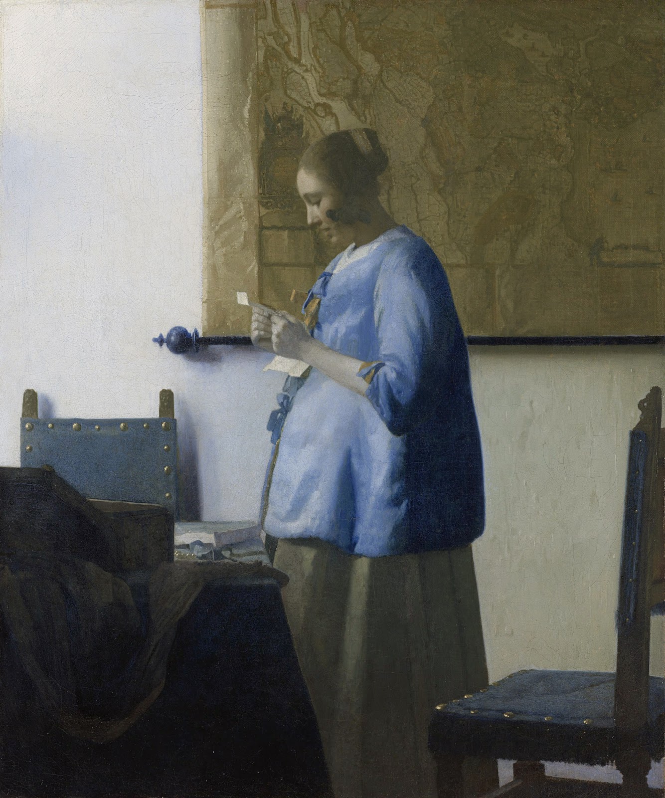 Belas Artes: Mulher de azul lendo uma carta