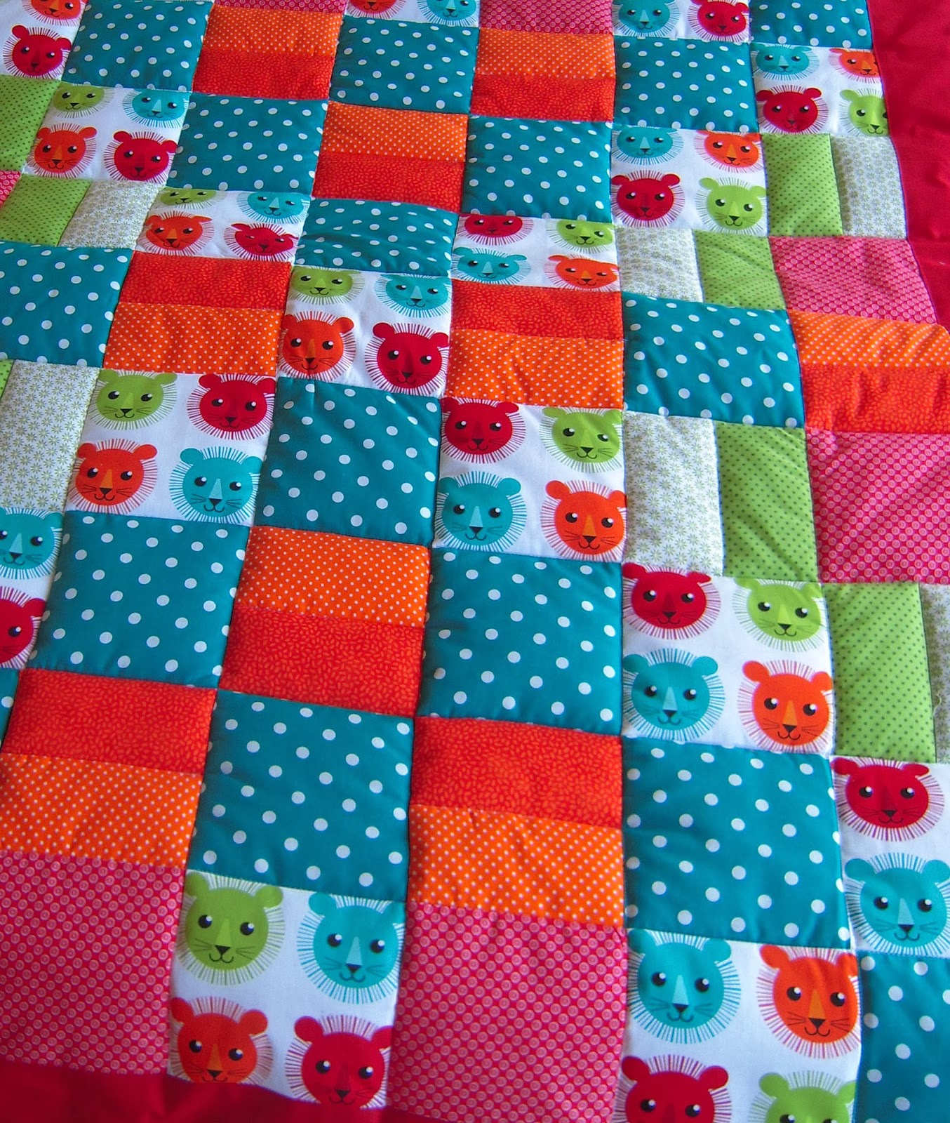 d'Inge: Patchwork - Babydecke Löwen