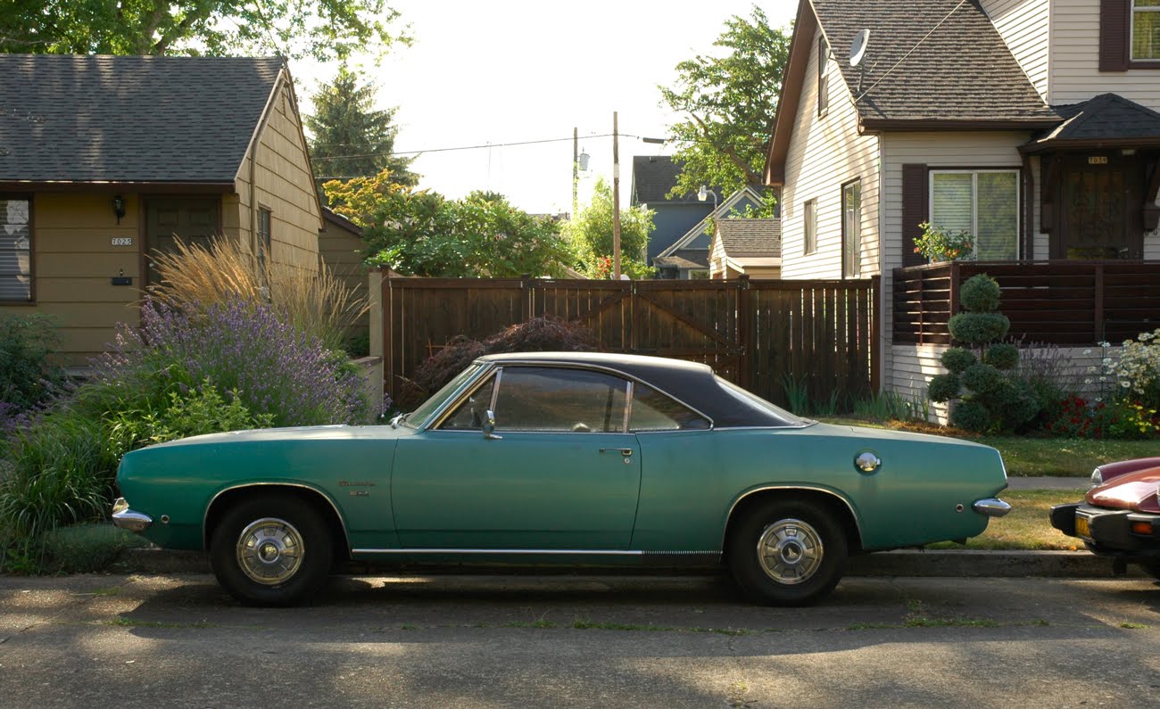 OLD PARKED CARS.: 1968 Plymouth Barracuda Notchback.