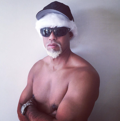Tiger Woods poses as Mac Daddy Santa for his kids