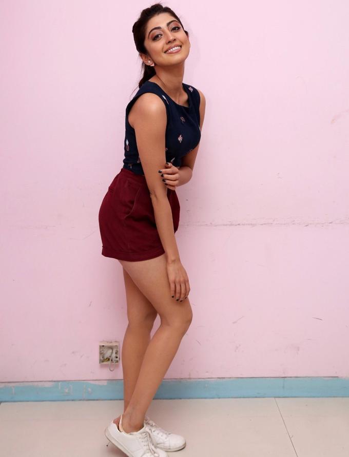 South Indian Model Pranitha Subhash Cross Legs Show In Red Mini Short