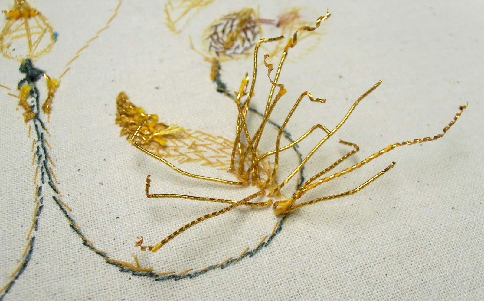 Goldwork WIP - couched gold leaves