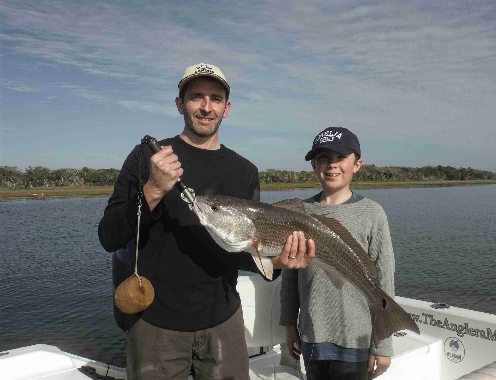 Oversized Redfish Followed By a Tourney Red