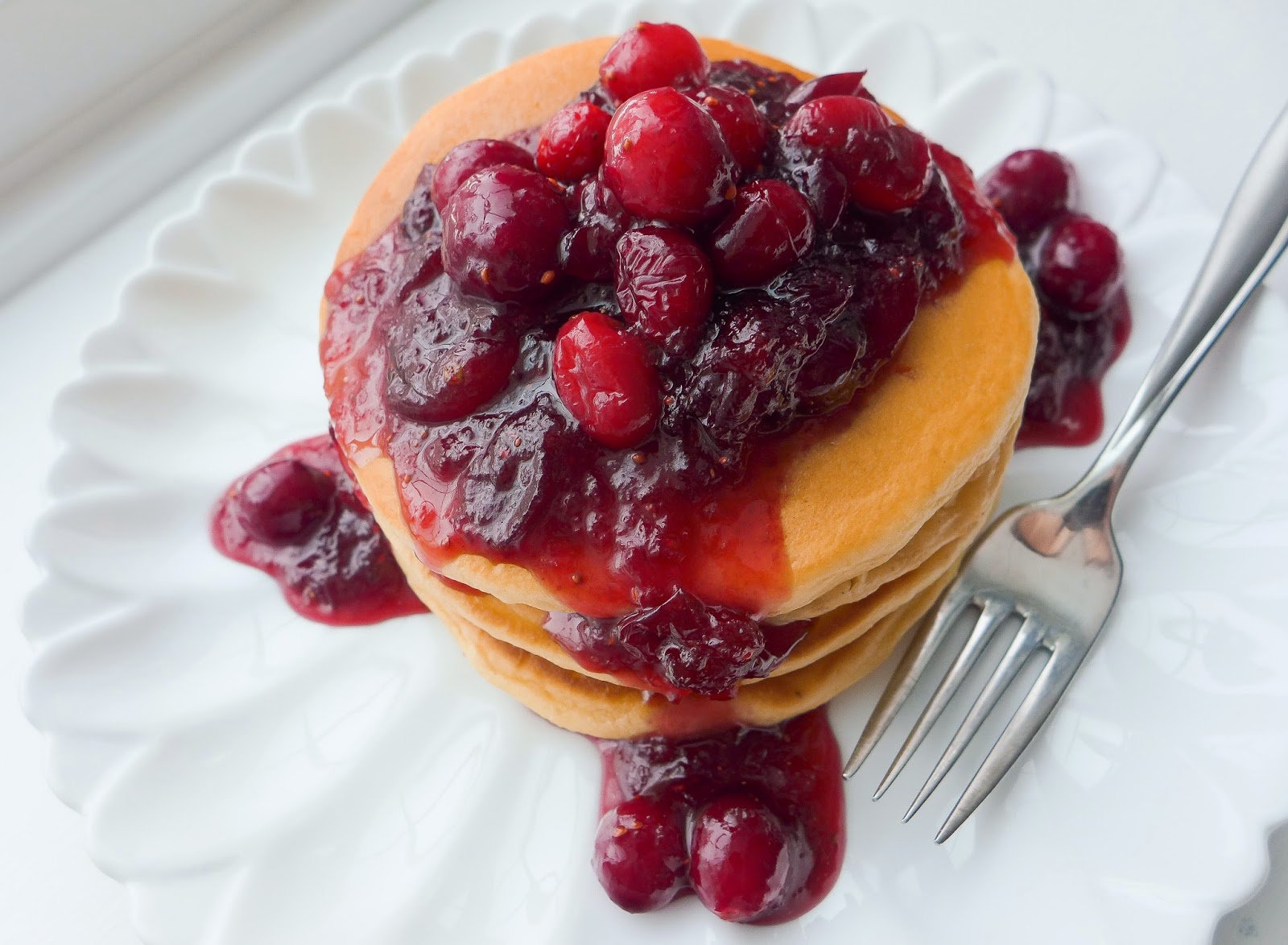 Dimples & Delights: Egg Nog Pancakes with Cranberry Maple Syrup