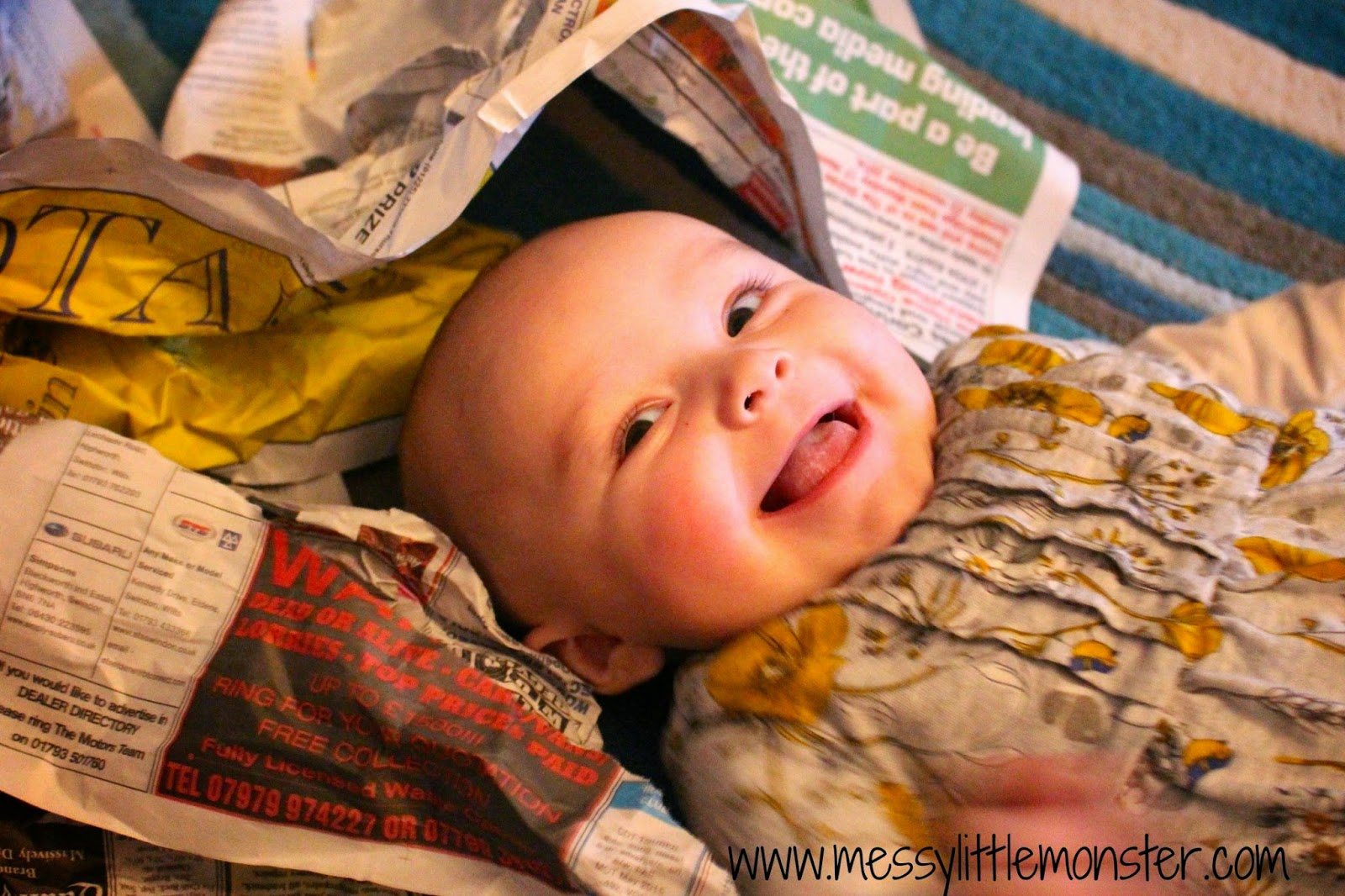 Baby Games with a Newspaper - 0-6 months - Messy Little Monster