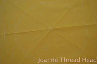 Thread Head: Orange Whole-cloth Quilt