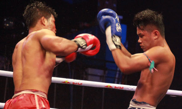 Long Sovandoeun, a second warn him to stop the boxing when a broken ...