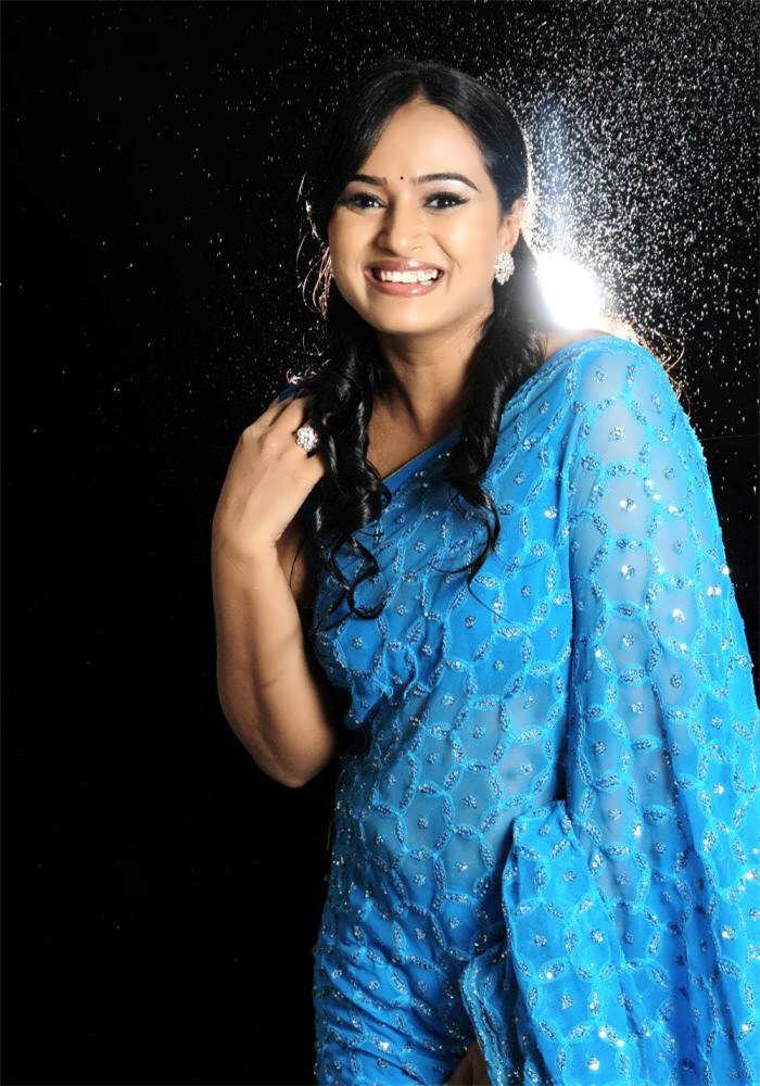 Actress Singer Anupama Romantic Blue Saree Stills