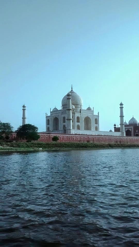 Delhi Magic: Taj Mahal view from a boat in Yamuna River