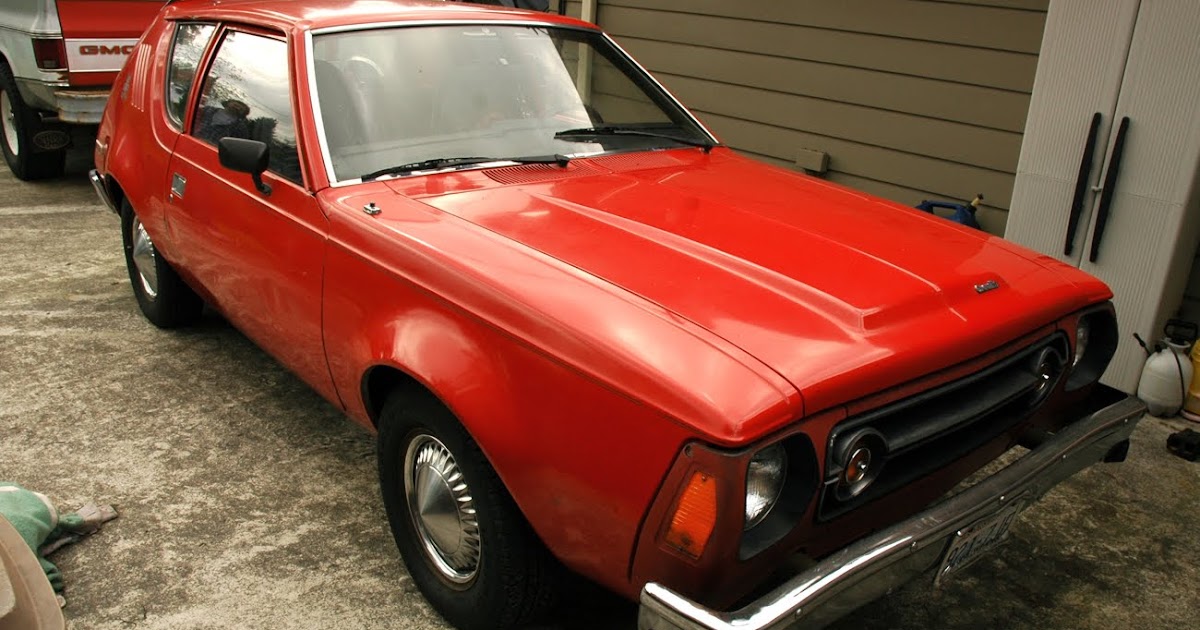 OLD PARKED CARS.: 1976 AMC Gremlin.