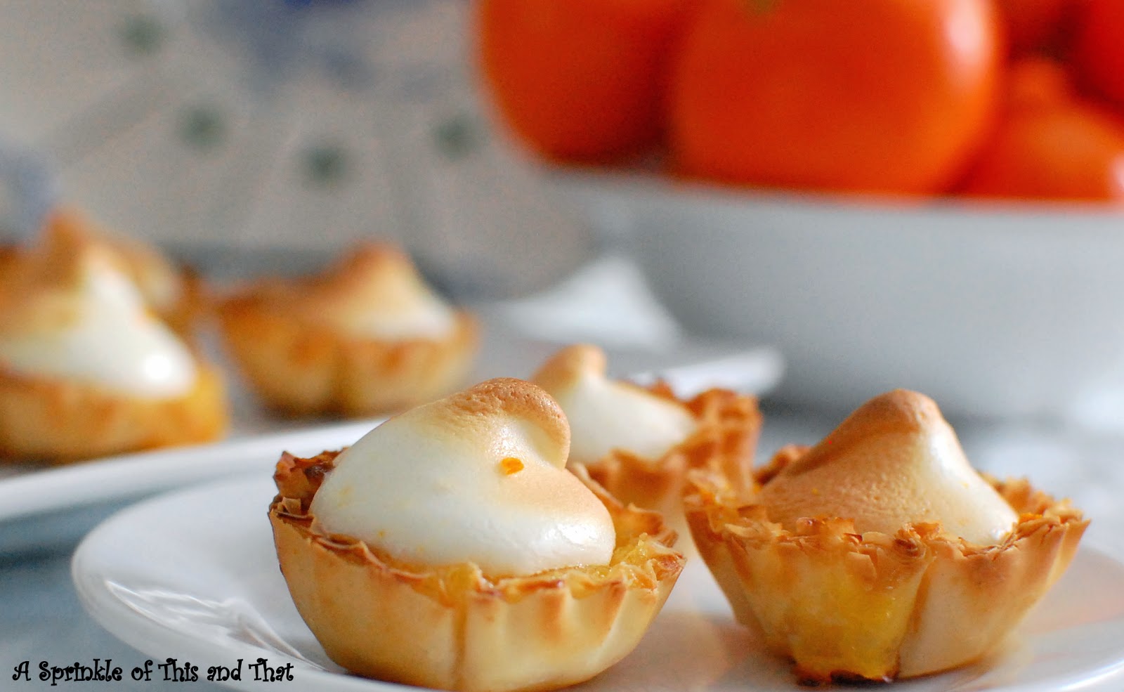 A Sprinkle of This and That: Orange Meringue Tarts