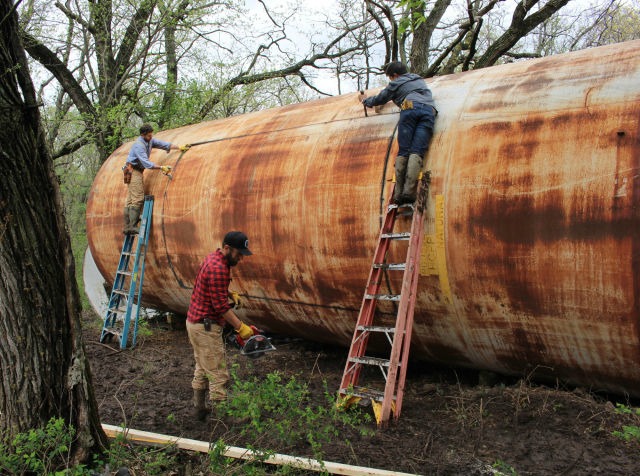 TINY HOUSE TOWN: Rusty Storage Tank Turned Tiny House