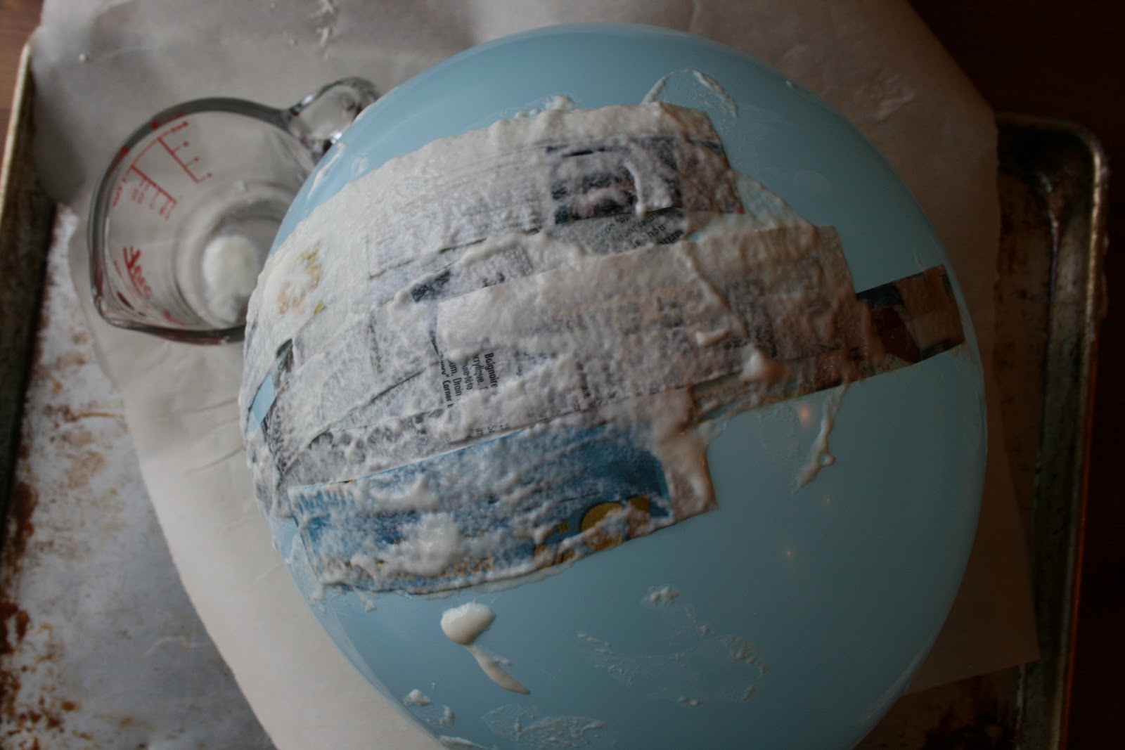 Experience the Wonderful.: paper mache masks.