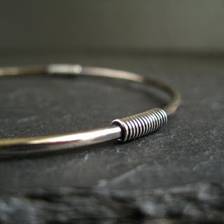 Silver And Copper Bangles With Coils