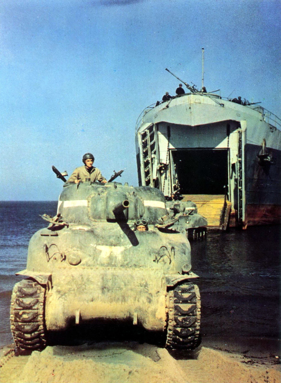 World War II in Color: Sherman Tanks Unloads from LST