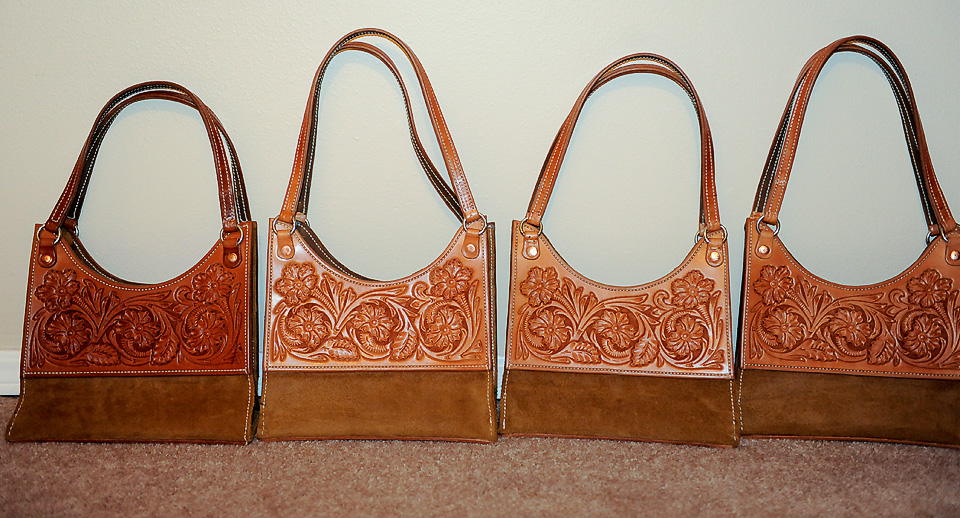 JD Folsom Custom Leather: Custom floral carved purses.