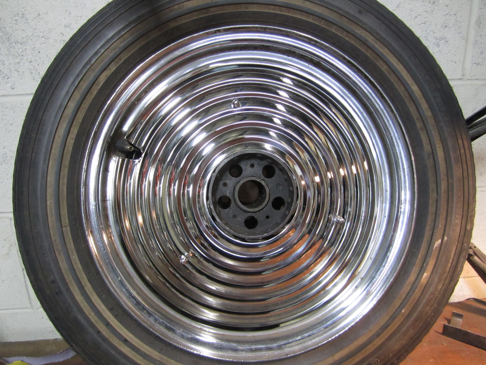 FRONT ST CYCLE: Ripple wheel covers. Fresh nickel plate