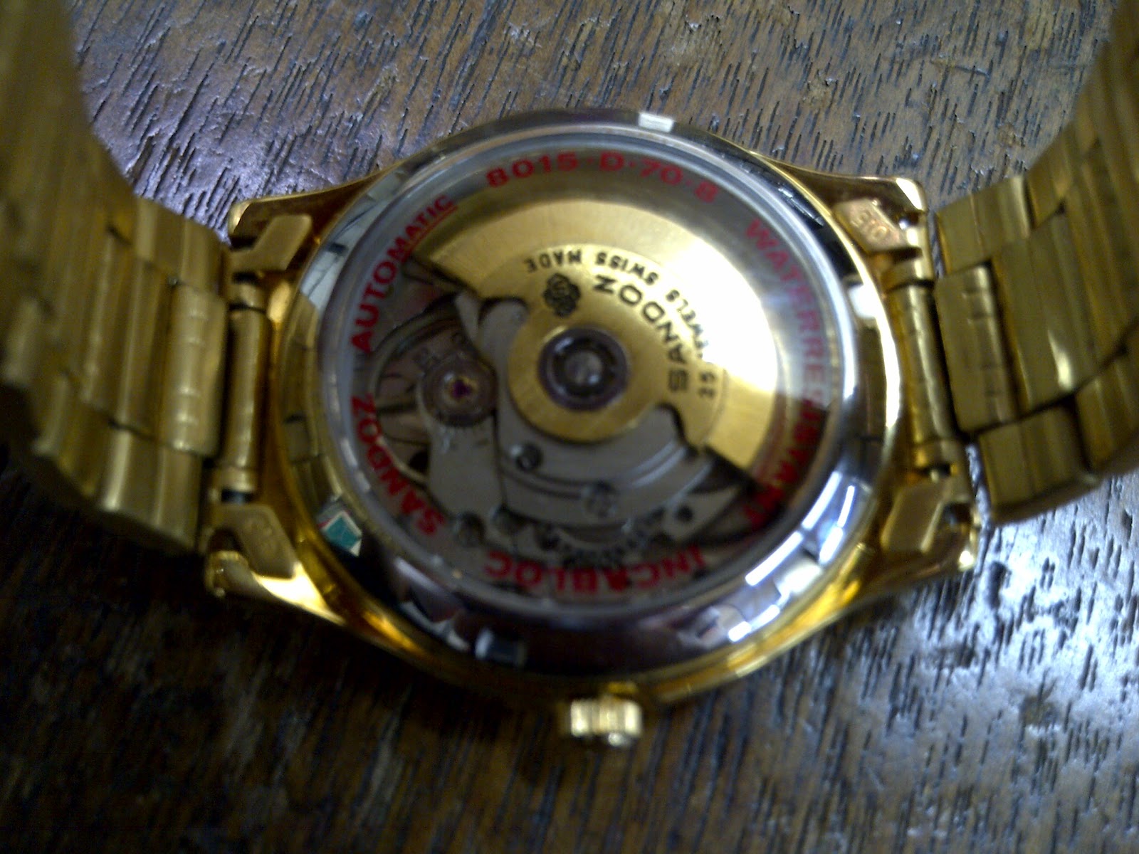 Vintage Watch: SANDOZ Rare SWISS MADE GOLD AUTOMATIC Watch