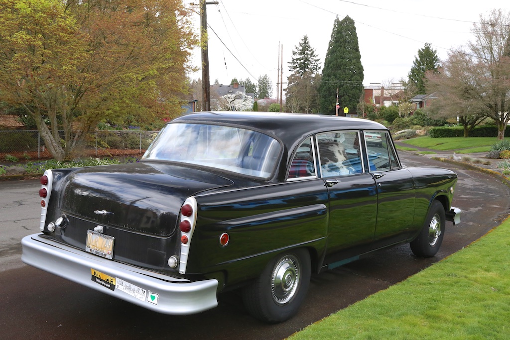 OLD PARKED CARS.: 1975 Checker Marathon.