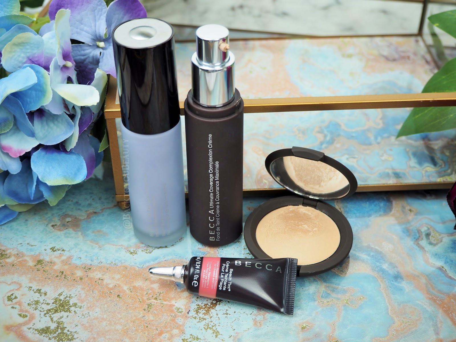 Get the Becca glow with the 4 Piece Ultimate Glow Complexion Kit