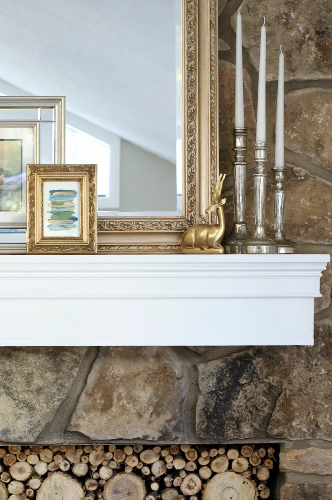 Faux Stacked Log Fireplace Tutorial | LiveLoveDIY | Bloglovin’