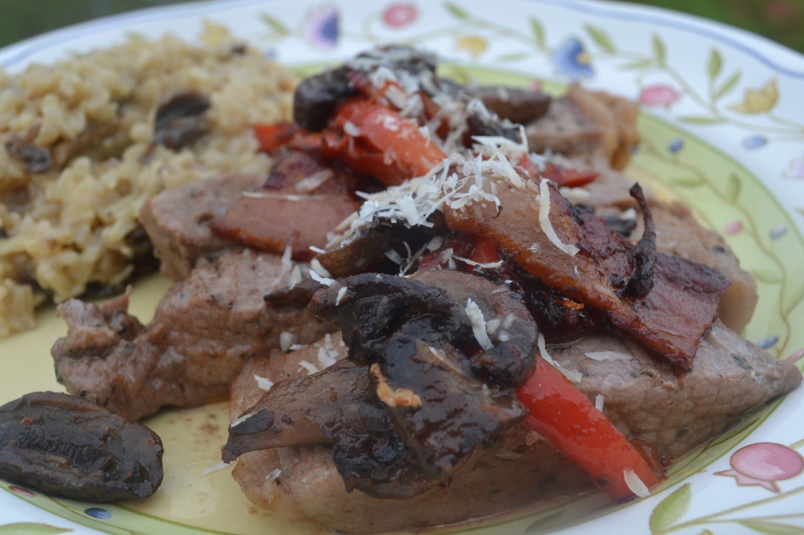 Manly Steak Topped with Bacon, Mushrooms, and Red Pepper
