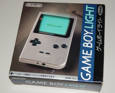 Retro Treasures: Silver Nintendo Game Boy Light