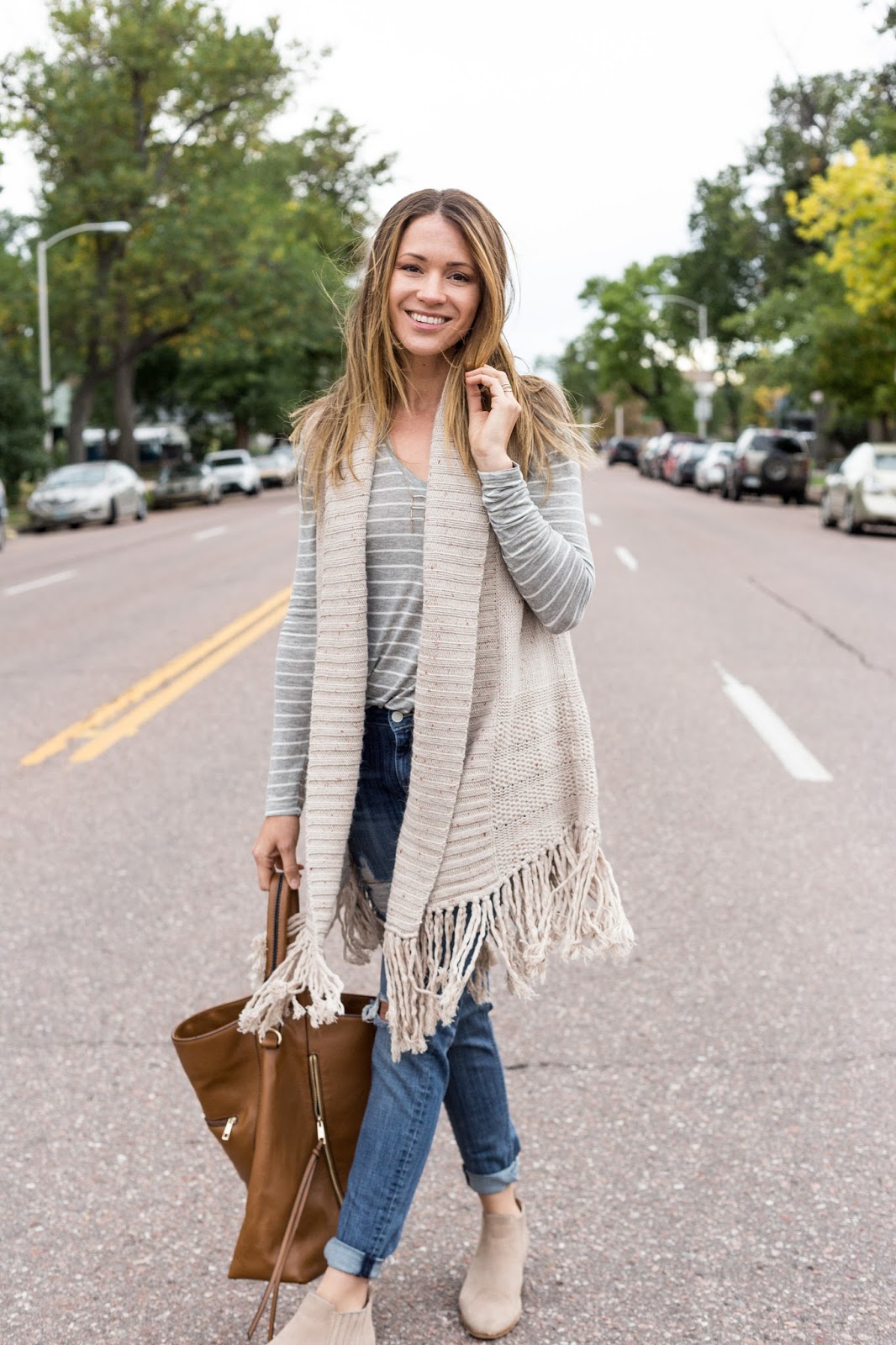 3 Tips For Layering A Fringe Vest For Fall - Leah Behr