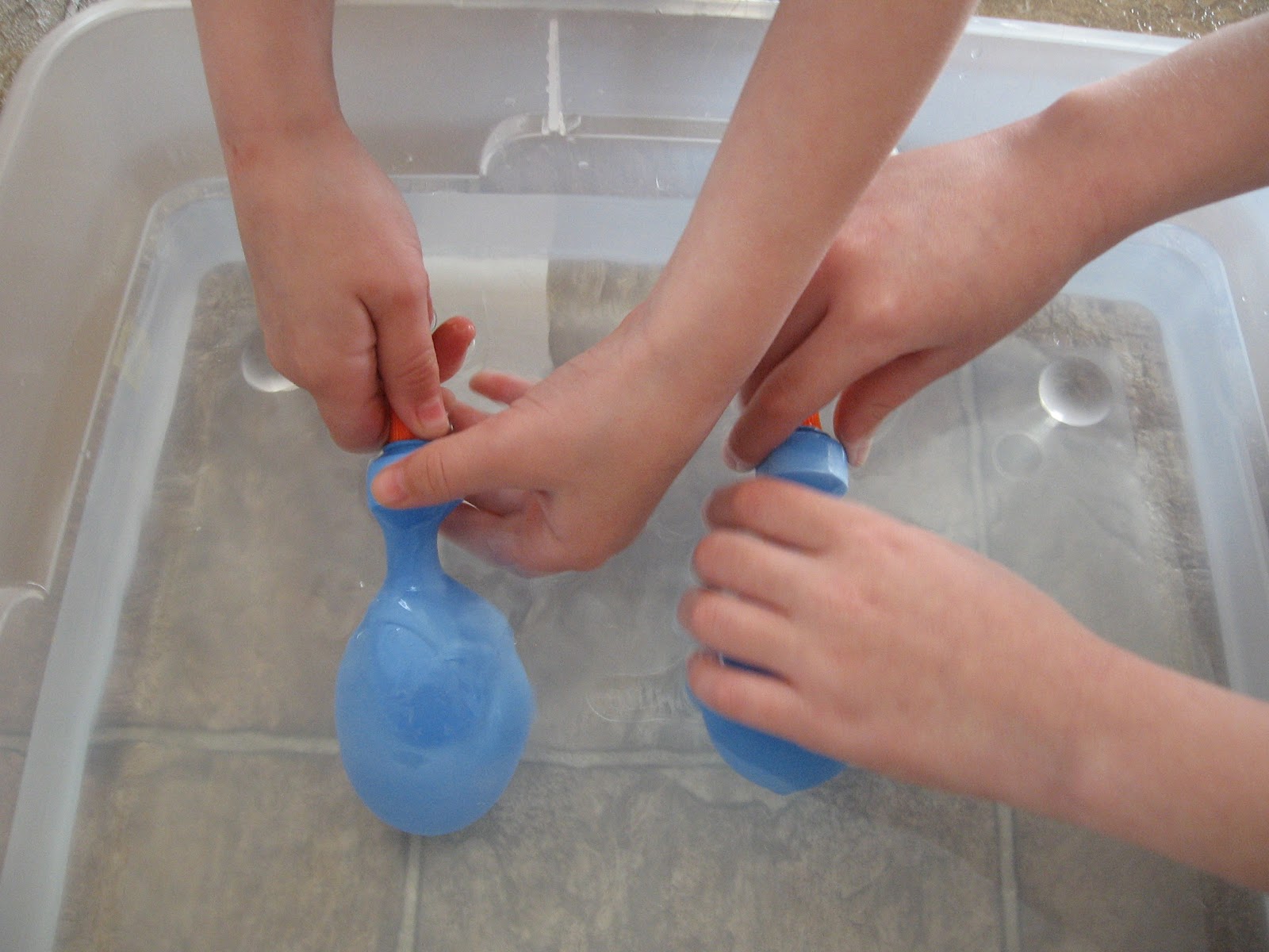 Almost Unschoolers: Science Play - Water Propelled Squid