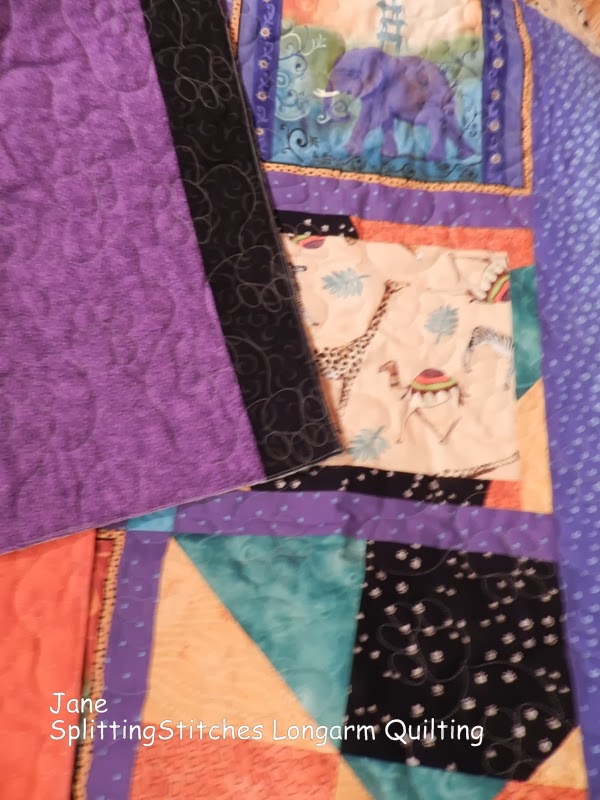 SplittingStitches Longarm Quilting: Quilt of the day...animal tracks!